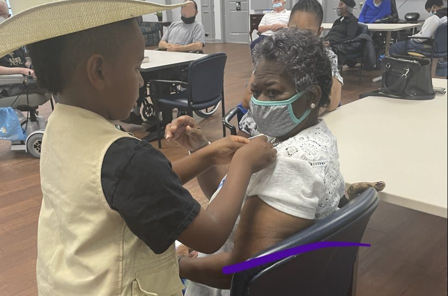 Third grader starts summer by volunteering - The Clinton Courier