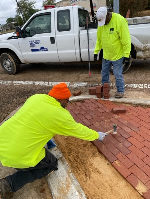 Bricks installed in trouble spot along Highway 80 - The Clinton Courier