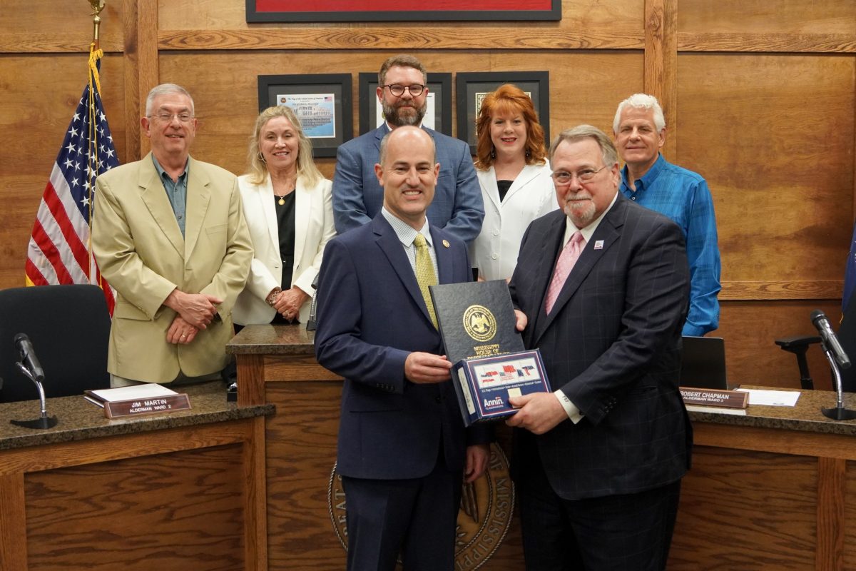 Fisher presented with proclamation, flag - The Clinton Courier